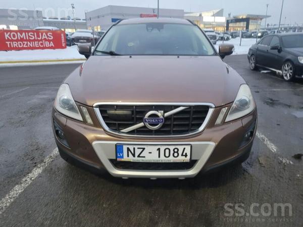 Brown Volvo XC60 2008 in Riga, with an engine capacity of 2.40 L and mileage of 265 thousand km for 9500 €, photo 1 on AUTOMOTO.COM.LV
