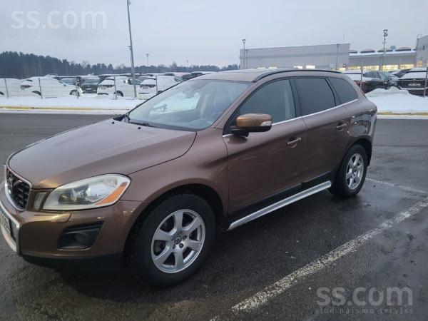Brown Volvo XC60 2008 in Riga, with an engine capacity of 2.40 L and mileage of 265 thousand km for 8300 €, photo 1 on AUTOMOTO.COM.LV
