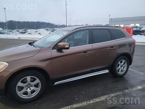 Brown Volvo XC60 2008 in Riga, with an engine capacity of 2.40 L and mileage of 265 thousand km for 8300 €, photo 7 on AUTOMOTO.COM.LV