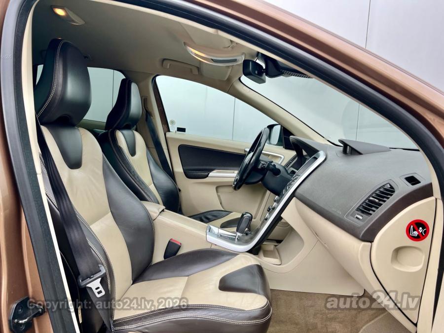Brūns Volvo XC60 2009 Tallina, ar dzinēja tilpumu 2.40 L un nobraukumu 251 tūkst. km par 6999 €, foto 14 vietnē AUTOMOTO.COM.LV