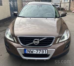 Brūns Volvo XC60 2009 Rīga, ar dzinēja tilpumu 2.40 L un nobraukumu 155 tūkst. km par 7100 €, foto  vietnē AUTOMOTO.COM.LV