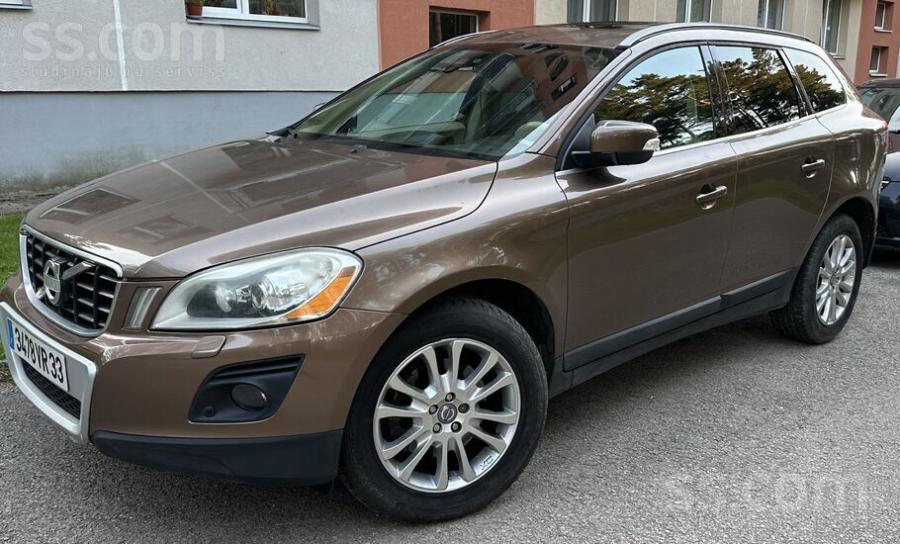 Brown Volvo XC60 2009 in Riga, with an engine capacity of 2.40 L and mileage of 155 thousand km for 7100 €, photo 4 on AUTOMOTO.COM.LV
