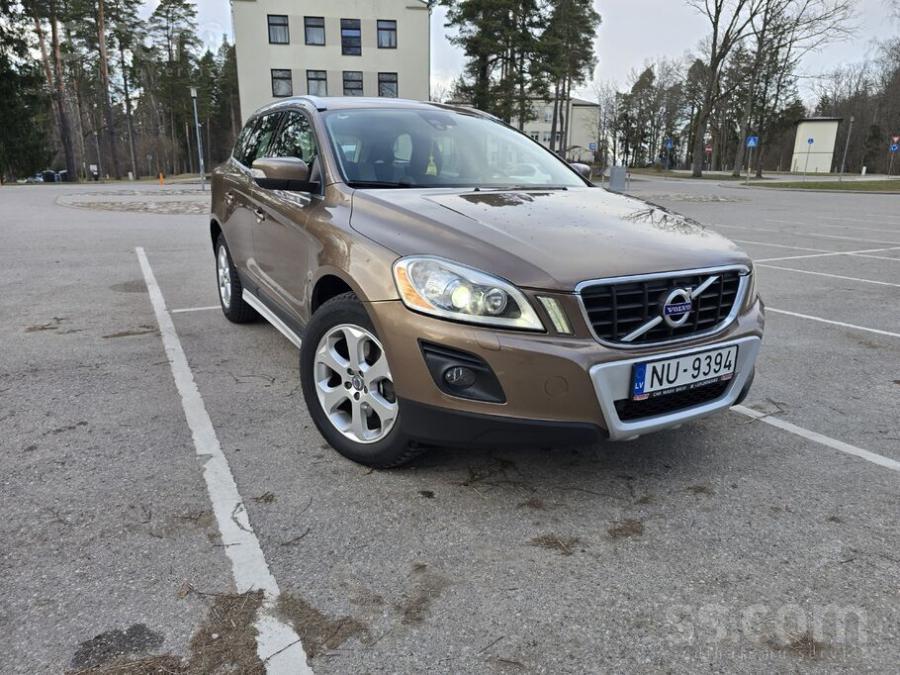 Brūns Volvo XC60 2009 Rīga, ar dzinēja tilpumu 2.40 L un nobraukumu 309 tūkst. km par 7700 €, foto 1 vietnē AUTOMOTO.COM.LV