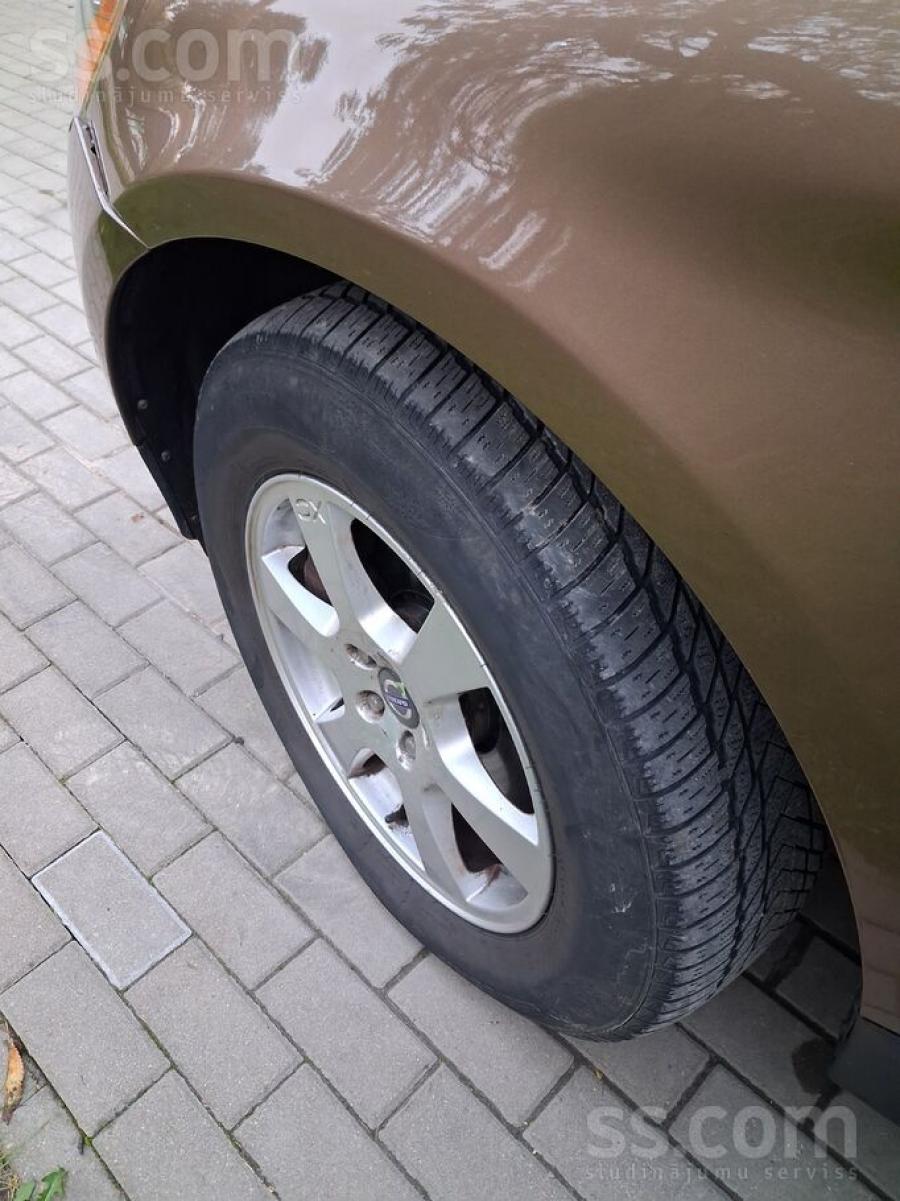 Brown Volvo XC60 2009 in Riga, with an engine capacity of 2.40 L and mileage of 323 thousand km for 6300 €, photo 8 on AUTOMOTO.COM.LV