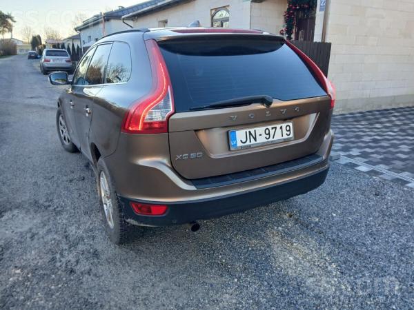Brown Volvo XC60 2010 in Riga, with an engine capacity of 2.00 L and mileage of 0 thousand km for 6700 €, photo 4 on AUTOMOTO.COM.LV