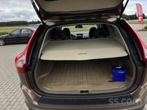 Brown Volvo XC60 2010 in Talsi, with an engine capacity of 2.40 L and mileage of 195 thousand km for 8970 €, photo 12 on AUTOMOTO.COM.LV