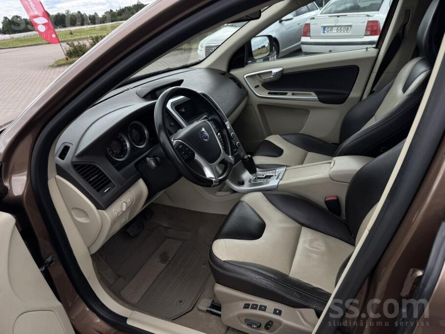 Brown Volvo XC60 2010 in Talsi, with an engine capacity of 2.40 L and mileage of 195 thousand km for 8970 €, photo 15 on AUTOMOTO.COM.LV