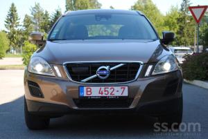Brown Volvo XC60 2010 in Riga, with an engine capacity of 2.40 L and mileage of 302 thousand km for 9590 €, photo 6 on AUTOMOTO.COM.LV