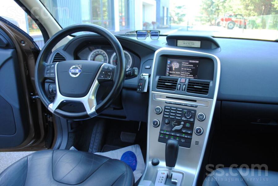 Brown Volvo XC60 2010 in Riga, with an engine capacity of 2.40 L and mileage of 302 thousand km for 9590 €, photo 18 on AUTOMOTO.COM.LV
