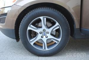 Brown Volvo XC60 2010 in Riga, with an engine capacity of 2.40 L and mileage of 302 thousand km for 9590 €, photo 20 on AUTOMOTO.COM.LV