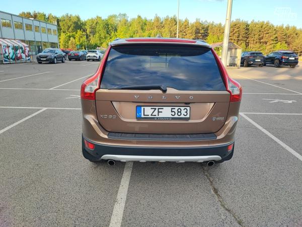 Brūns Volvo XC60 2010 Viļņa, ar dzinēja tilpumu 2.40 L un nobraukumu 311 tūkst. km par 6700 €, foto 4 vietnē AUTOMOTO.COM.LV