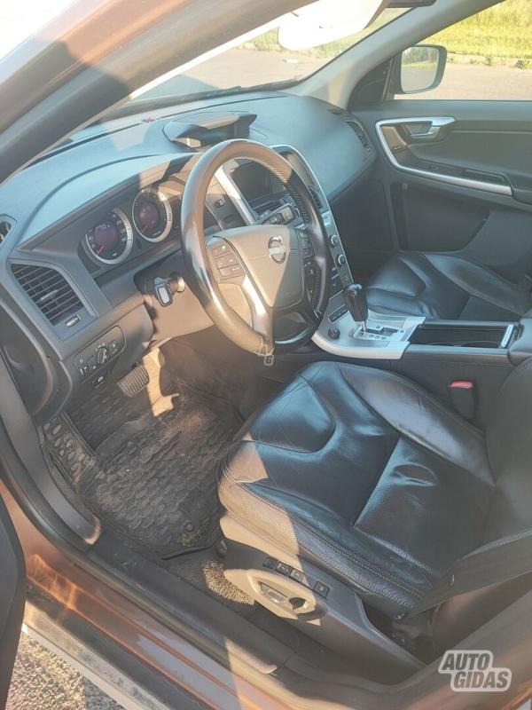 Brūns Volvo XC60 2010 Viļņa, ar dzinēja tilpumu 2.40 L un nobraukumu 311 tūkst. km par 6700 €, foto 7 vietnē AUTOMOTO.COM.LV