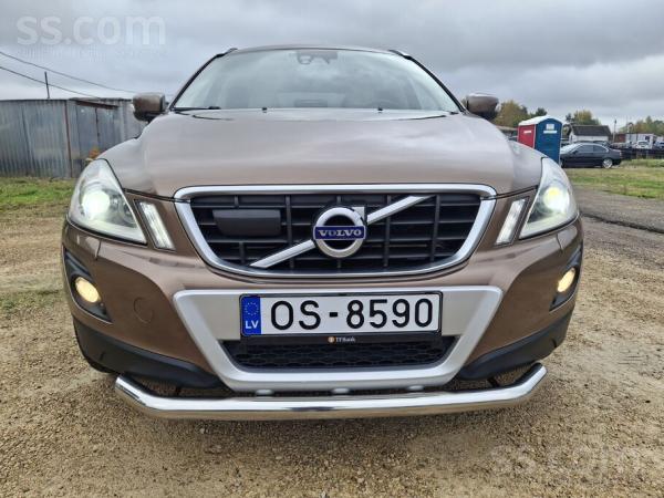 Brown Volvo XC60 2010 in Riga, with an engine capacity of 2.40 L and mileage of 319 thousand km for 8495 €, photo 5 on AUTOMOTO.COM.LV
