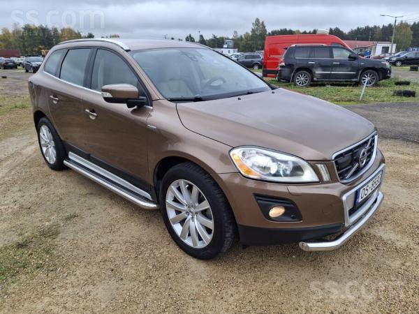 Brown Volvo XC60 2010 in Riga, with an engine capacity of 2.40 L and mileage of 319 thousand km for 8495 €, photo 7 on AUTOMOTO.COM.LV