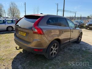 Brown Volvo XC60 2011 in Ogre, with an engine capacity of 2.00 L and mileage of 215 thousand km for 3090 €, photo 4 on AUTOMOTO.COM.LV