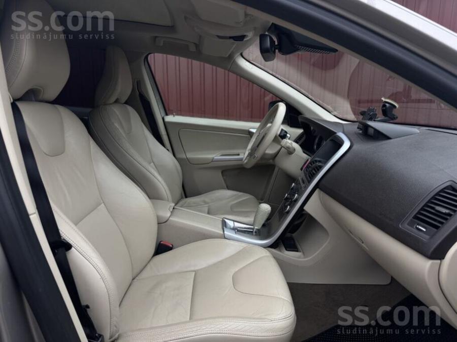 Brown Volvo XC60 2011 in Liepaja, with an engine capacity of 2.40 L and mileage of 239 thousand km for 9750 €, photo 7 on AUTOMOTO.COM.LV