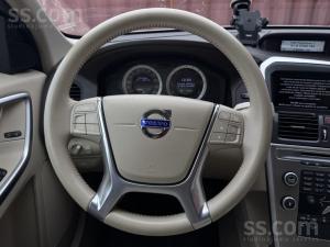 Brown Volvo XC60 2011 in Liepaja, with an engine capacity of 2.40 L and mileage of 239 thousand km for 9750 €, photo 9 on AUTOMOTO.COM.LV
