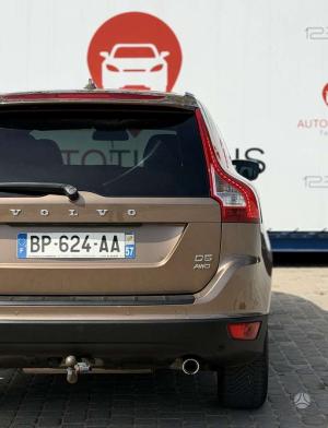 Brūns Volvo XC60 2011 Tauragė, ar dzinēja tilpumu 2.40 L un nobraukumu 276 tūkst. km par 7800 €, foto 23 vietnē AUTOMOTO.COM.LV