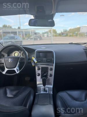 Brown Volvo XC60 2011 in Riga, with an engine capacity of 2.40 L and mileage of 276 thousand km for 9500 €, photo 8 on AUTOMOTO.COM.LV