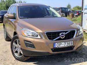 Brown Volvo XC60 2012 in Riga, with an engine capacity of 2.40 L and mileage of 225 thousand km for 10995 €, photo  on AUTOMOTO.COM.LV