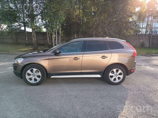 Brown Volvo XC60 2012 in Riga, with an engine capacity of 2.40 L and mileage of 264 thousand km for 10600 €, photo 6 on AUTOMOTO.COM.LV
