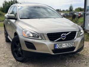 Brūns Volvo XC60 2012 Rīga, ar dzinēja tilpumu 2.40 L un nobraukumu 183 tūkst. km par 10995 €, foto  vietnē AUTOMOTO.COM.LV
