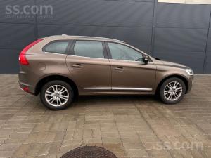 Brown Volvo XC60 2013 in Riga, with an engine capacity of 2.40 L and mileage of 350 thousand km for 6600 €, photo 2 on AUTOMOTO.COM.LV