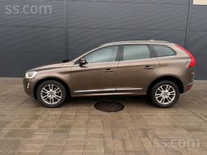 Brown Volvo XC60 2013 in Riga, with an engine capacity of 2.40 L and mileage of 350 thousand km for 6600 €, photo 5 on AUTOMOTO.COM.LV