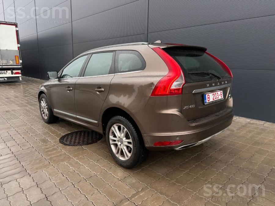 Brown Volvo XC60 2013 in Riga, with an engine capacity of 2.40 L and mileage of 350 thousand km for 6600 €, photo 6 on AUTOMOTO.COM.LV