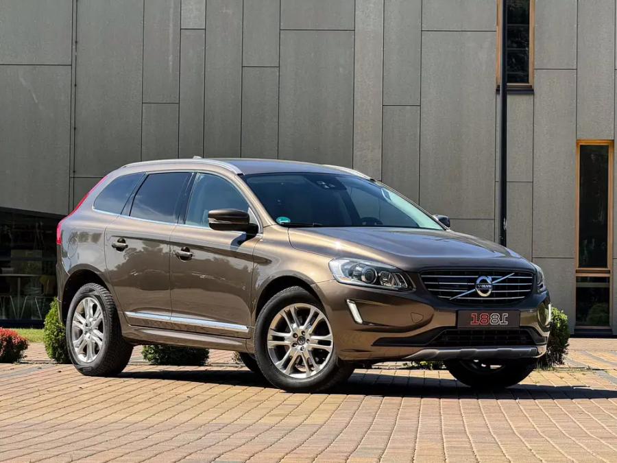 Brown Volvo XC60 2013 in Riga, with an engine capacity of 2.40 L and mileage of 238 thousand km for 13300 €, photo 1 on AUTOMOTO.COM.LV