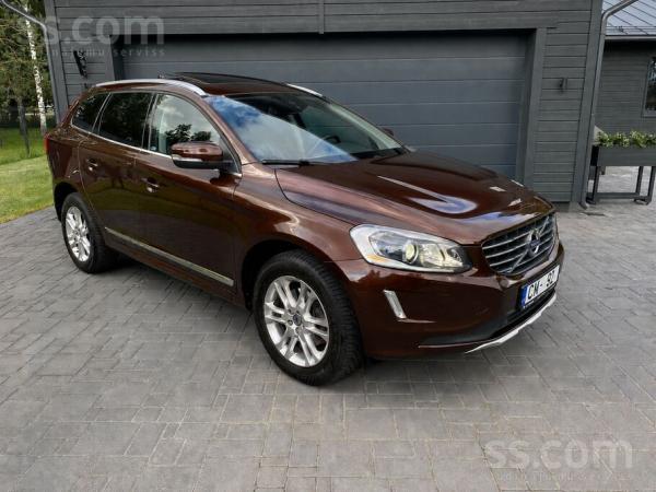 Brown Volvo XC60 2013 in Riga, with an engine capacity of 2.40 L and mileage of 175 thousand km for 12990 €, photo 1 on AUTOMOTO.COM.LV