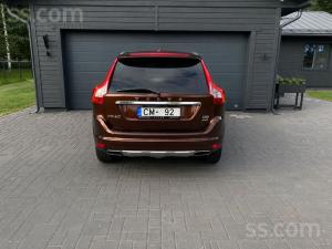 Brown Volvo XC60 2013 in Riga, with an engine capacity of 2.40 L and mileage of 175 thousand km for 12990 €, photo 6 on AUTOMOTO.COM.LV