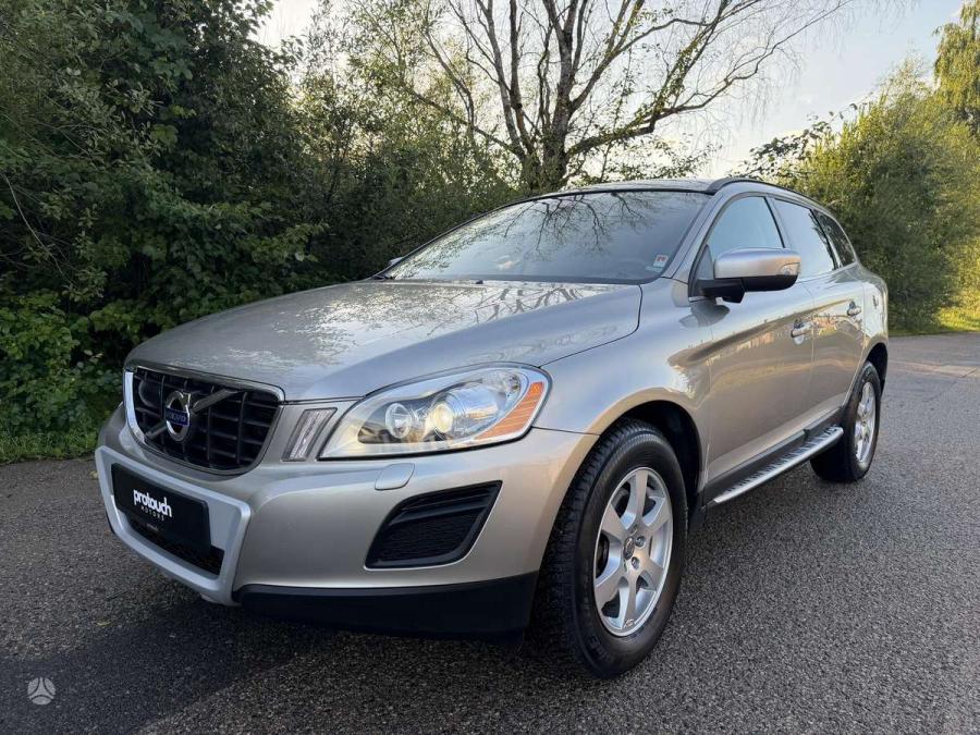 Brown Volvo XC60 2013 in Utena, with an engine capacity of 2.40 L and mileage of 313 thousand km for 9750 €, photo 42 on AUTOMOTO.COM.LV