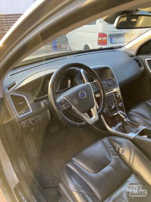 Brown Volvo XC60 2013 in Prienai, with an engine capacity of 2.00 L and mileage of 312 thousand km for 9000 €, photo 6 on AUTOMOTO.COM.LV