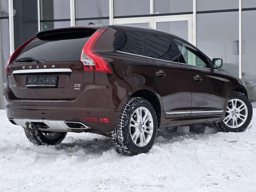 Brown Volvo XC60 2014 in Vilnius, with an engine capacity of 2.40 L and mileage of 275 thousand km for 14450 €, photo 7 on AUTOMOTO.COM.LV