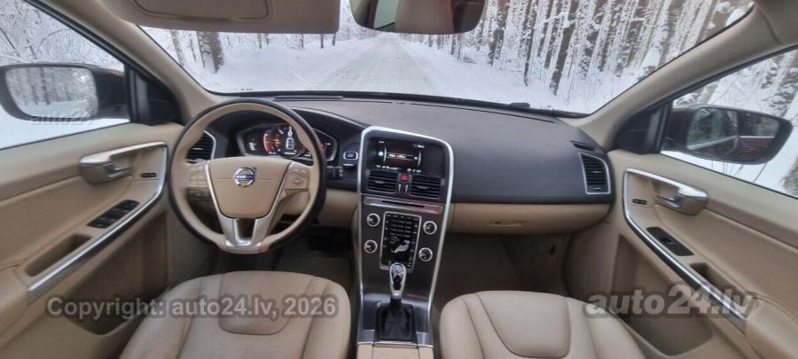 Brown Volvo XC60 2014 in Tallinn, with an engine capacity of 2.40 L and mileage of 250 thousand km for 12900 €, photo 8 on AUTOMOTO.COM.LV