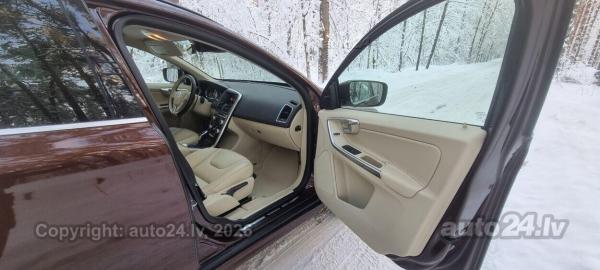 Brown Volvo XC60 2014 in Tallinn, with an engine capacity of 2.40 L and mileage of 250 thousand km for 12900 €, photo 9 on AUTOMOTO.COM.LV
