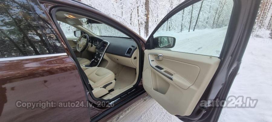Brown Volvo XC60 2014 in Tallinn, with an engine capacity of 2.40 L and mileage of 250 thousand km for 12900 €, photo 9 on AUTOMOTO.COM.LV
