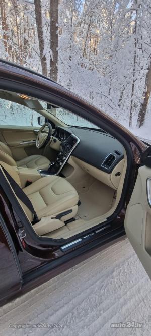 Brown Volvo XC60 2014 in Tallinn, with an engine capacity of 2.40 L and mileage of 250 thousand km for 12900 €, photo 10 on AUTOMOTO.COM.LV