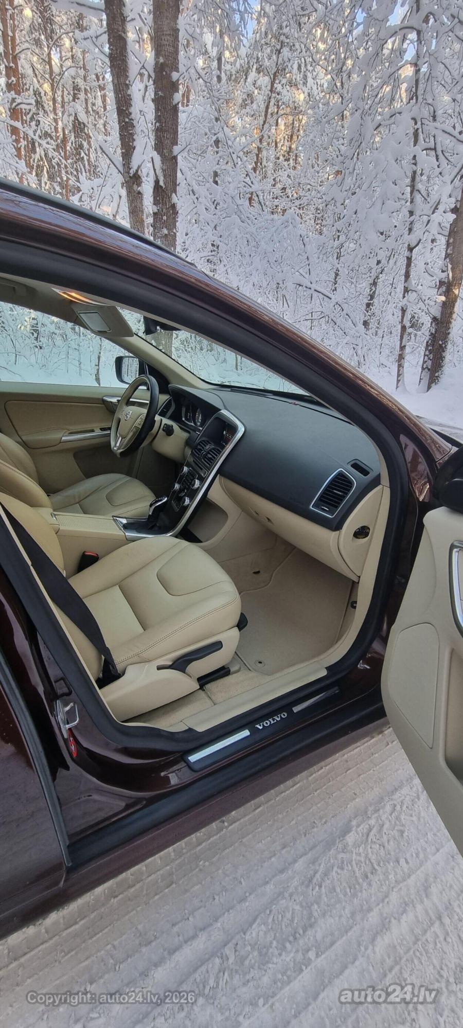 Brown Volvo XC60 2014 in Tallinn, with an engine capacity of 2.40 L and mileage of 250 thousand km for 12900 €, photo 10 on AUTOMOTO.COM.LV