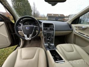 Brown Volvo XC60 2014 in Riga, with an engine capacity of 2.40 L and mileage of 117 thousand km for 15400 €, photo 6 on AUTOMOTO.COM.LV