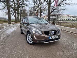 Brown Volvo XC60 2014 in Valmiera, with an engine capacity of 2.40 L and mileage of 274 thousand km for 13950 €, photo  on AUTOMOTO.COM.LV