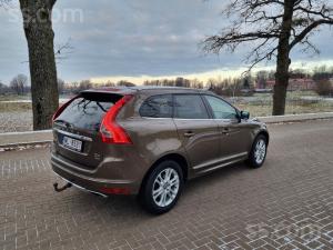 Brown Volvo XC60 2014 in Valmiera, with an engine capacity of 2.40 L and mileage of 274 thousand km for 13950 €, photo 2 on AUTOMOTO.COM.LV
