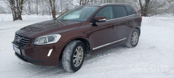 Brown Volvo XC60 2014 in Saldus, with an engine capacity of 2.40 L and mileage of 345 thousand km for 11700 €, photo 5 on AUTOMOTO.COM.LV