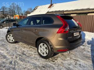 Brown Volvo XC60 2014 in Riga, with an engine capacity of 2.00 L and mileage of 192 thousand km for 10950 €, photo 2 on AUTOMOTO.COM.LV