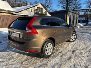 Brown Volvo XC60 2014 in Riga, with an engine capacity of 2.00 L and mileage of 192 thousand km for 10950 €, photo 6 on AUTOMOTO.COM.LV