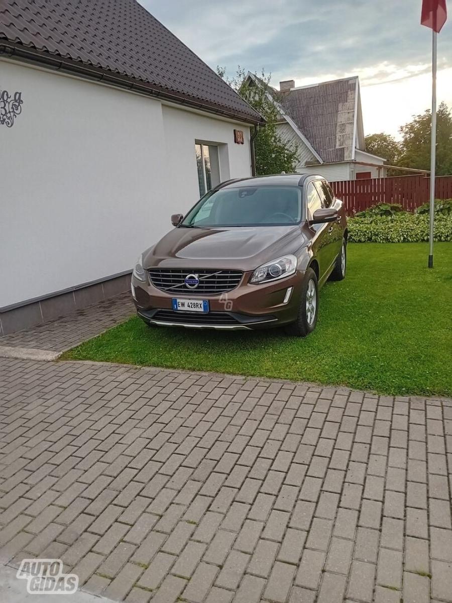 Brown Volvo XC60 2014 in Vilnius, with an engine capacity of 2.00 L and mileage of 294 thousand km for 12800 €, photo 13 on AUTOMOTO.COM.LV
