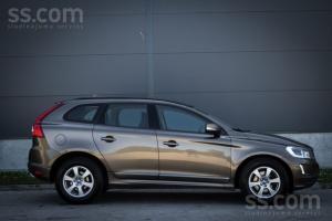 Brown Volvo XC60 2014 in Riga, with an engine capacity of 2.40 L and mileage of 330 thousand km for 10990 €, photo 6 on AUTOMOTO.COM.LV