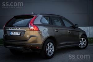 Brown Volvo XC60 2014 in Riga, with an engine capacity of 2.40 L and mileage of 330 thousand km for 10990 €, photo 11 on AUTOMOTO.COM.LV