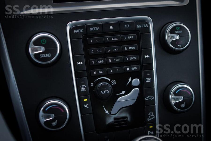 Brown Volvo XC60 2014 in Riga, with an engine capacity of 2.40 L and mileage of 330 thousand km for 10990 €, photo 19 on AUTOMOTO.COM.LV
